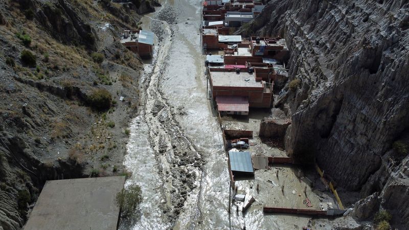Bolivia’s heavy rains cause river to flood homes near La Paz | Salem ...
